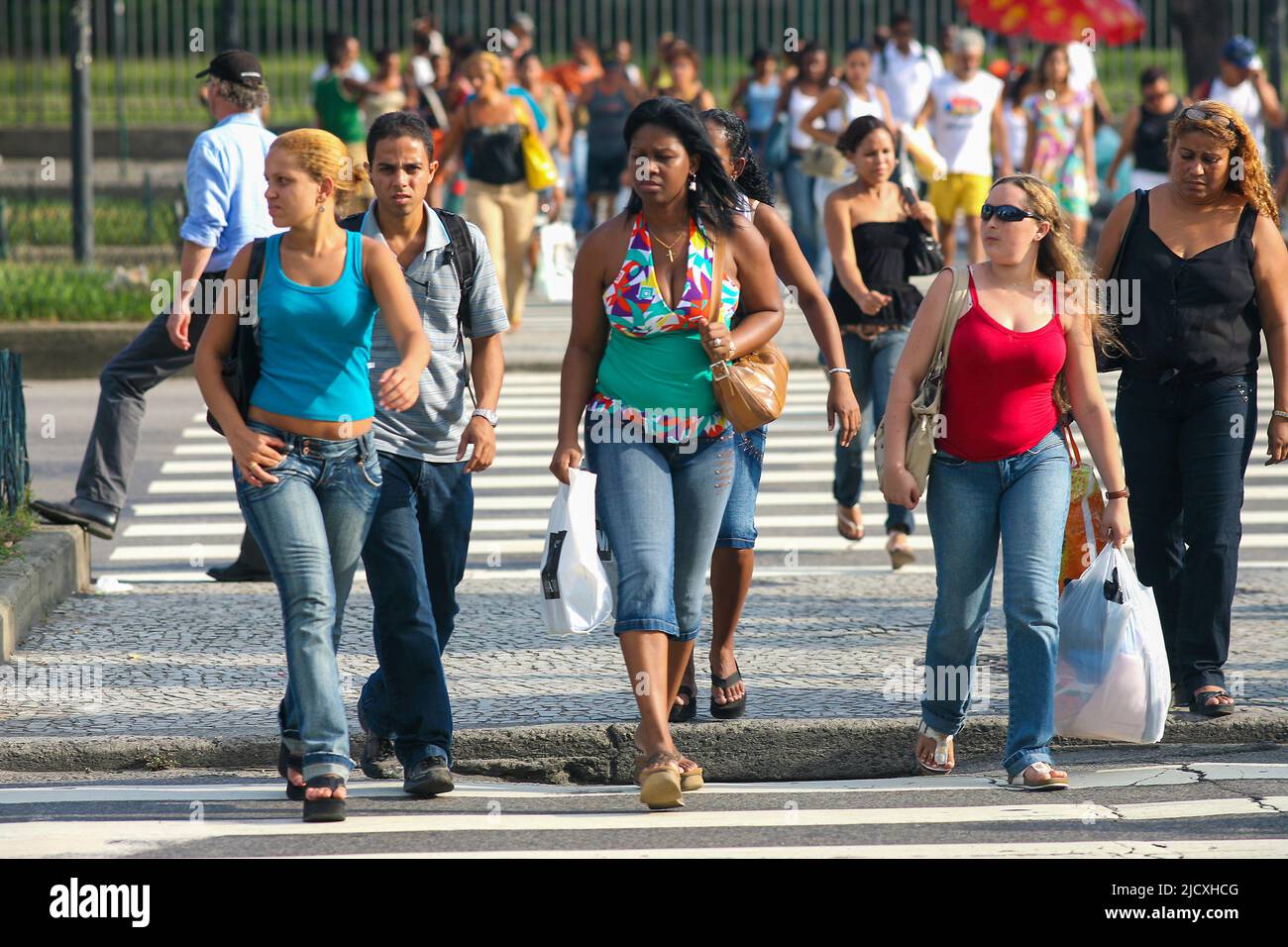 Brazil, Rio de Janeiro, pedestrians crossing a main road in the ...