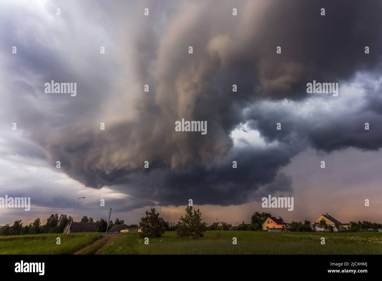 Storm clouds over field, tornadic supercell, extreme weather, dangerous ...