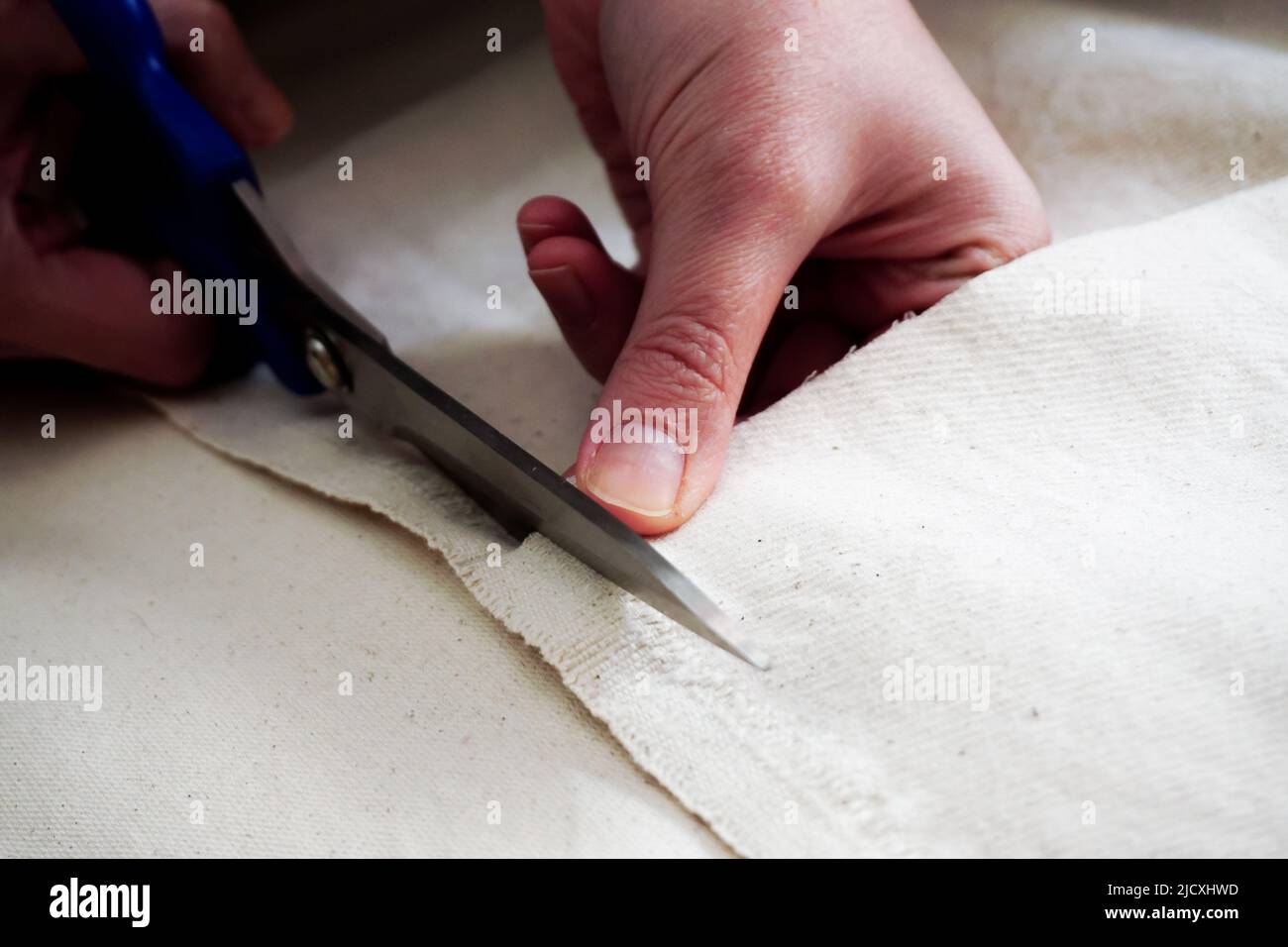 Black fabric cutting hi-res stock photography and images - Alamy
