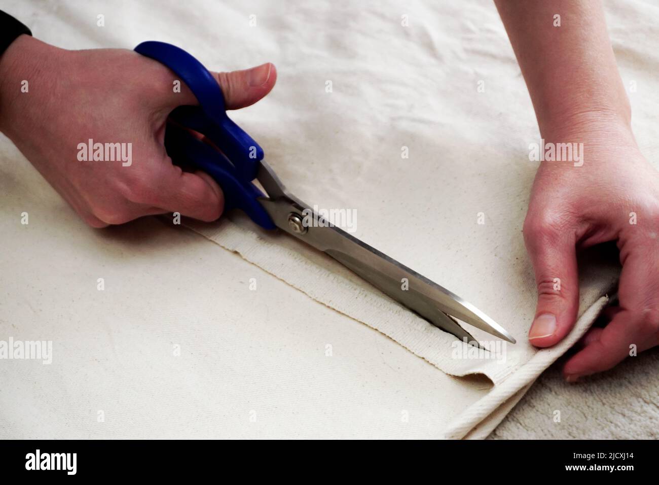 Black fabric cutting hi-res stock photography and images - Alamy