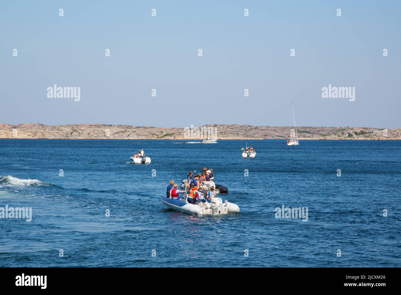 Children in inflatable boat hi-res stock photography and images - Alamy