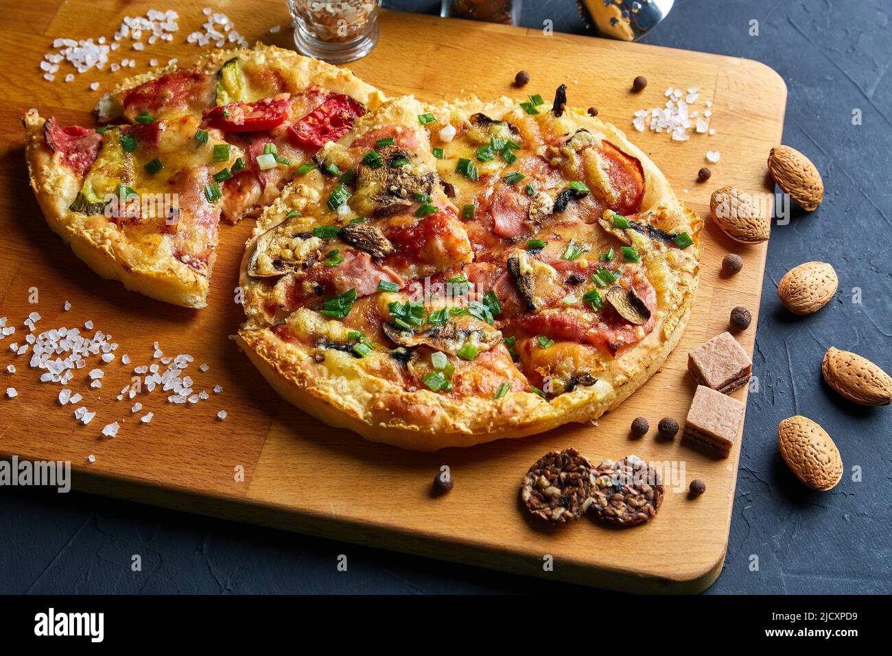 Fresh Homemade Italian Pizza with different ingredients Stock Photo - Alamy