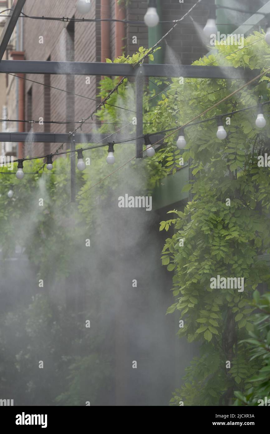 Facility that lowers temperature by spraying water. Water fog machine ...