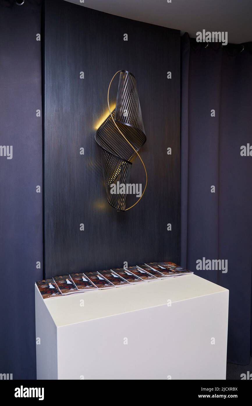 Beautiful lamp and a lot of magazines on rack Stock Photo - Alamy