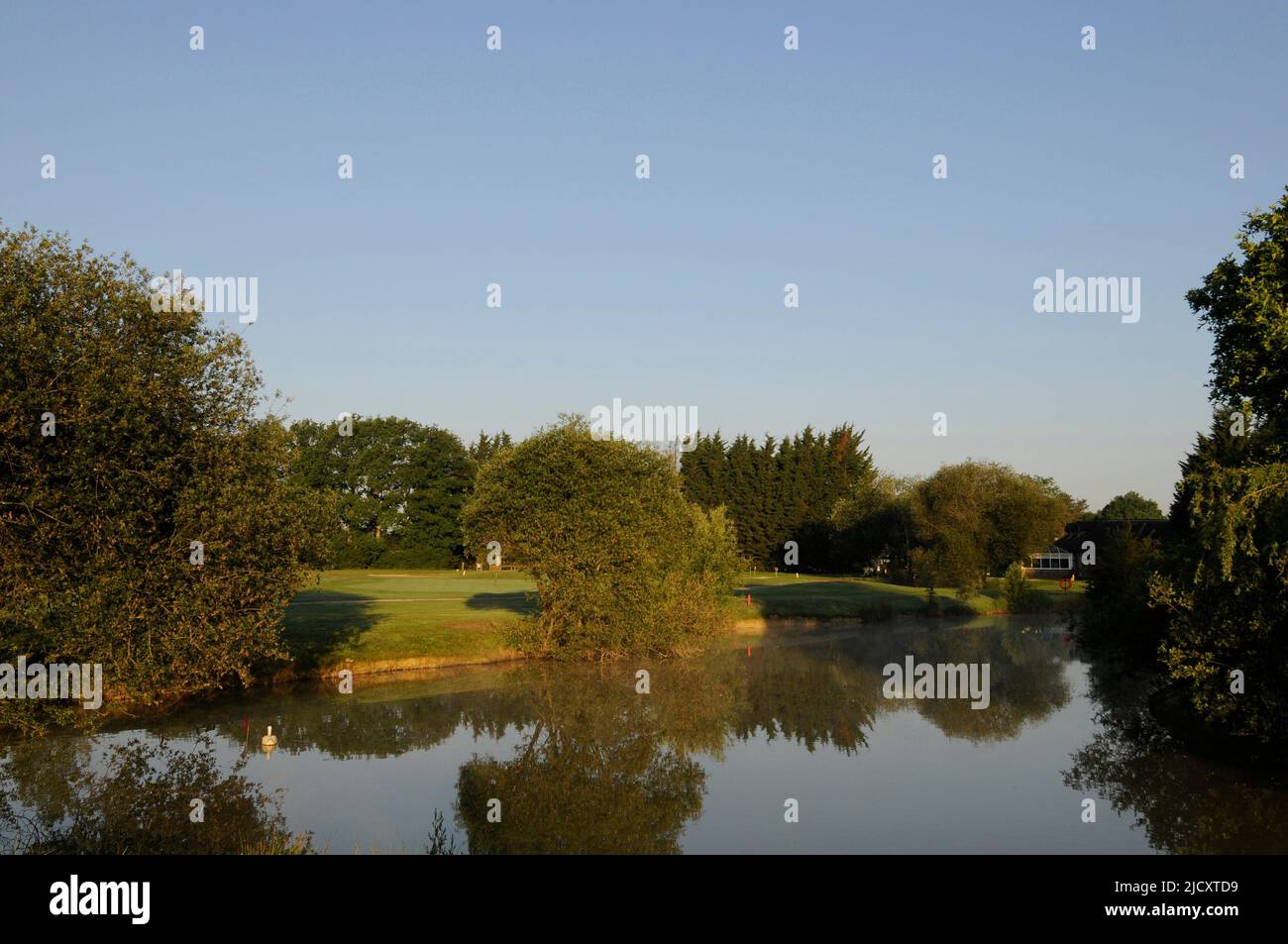 View over part of the pond with early morning mist to 9th Green, Horne ...