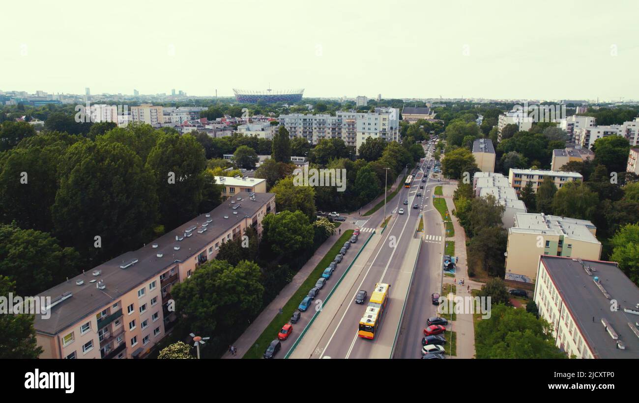 Aerial view of a street in suburbs of a big modern city with low-rise ...