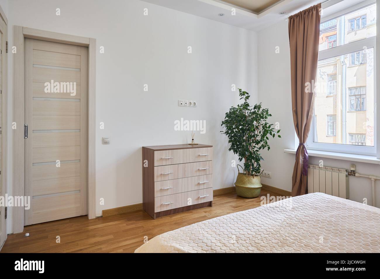 Cozy room with decor for daily rent Stock Photo - Alamy