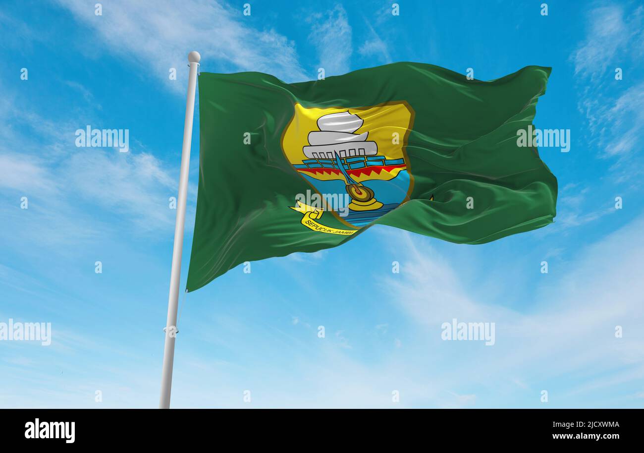 official flag of Jambi Indonesia at cloudy sky background on sunset ...
