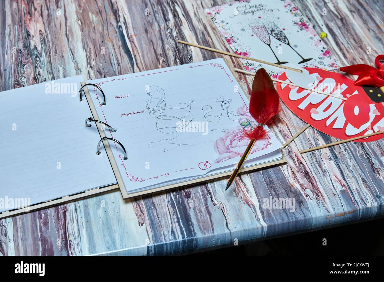 A photograph of a drawing of swans in a notebook Stock Photo - Alamy