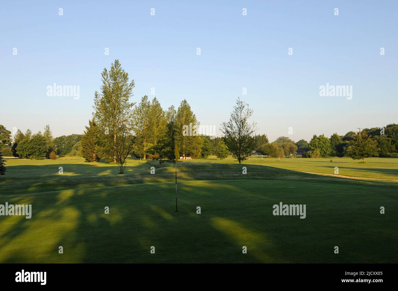 Early morning view of the 1st Green with yellow flag, Horne Park Golf ...