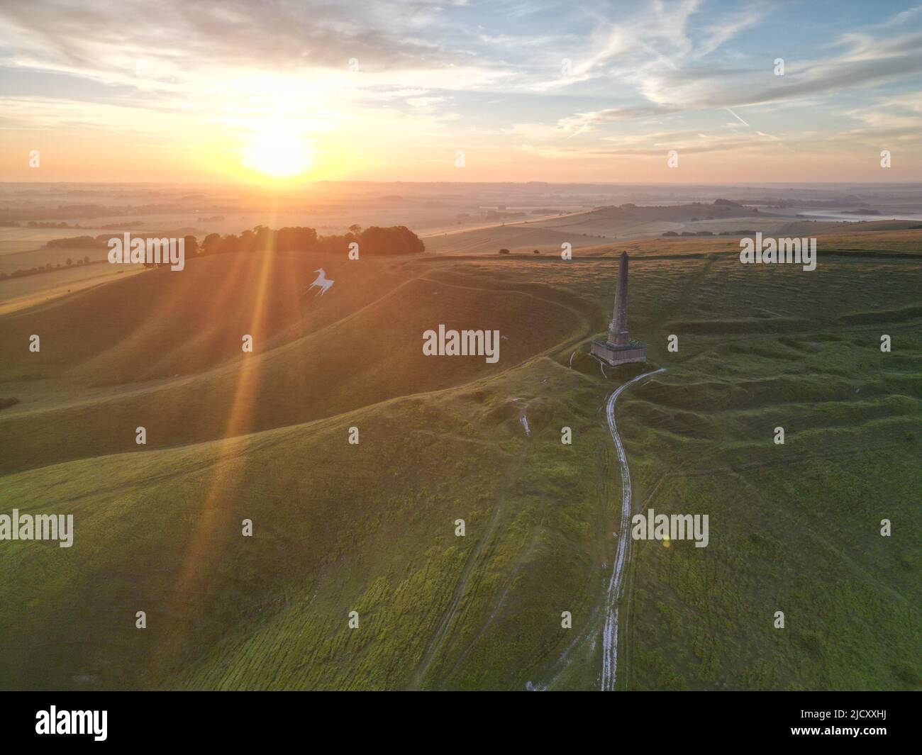 Sunrise. Lansdowne Monument. Cherhill White Horse. Oldbury hillfort ...