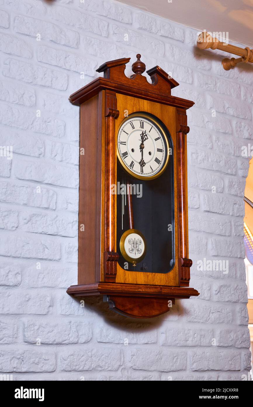 Photo of an old antique clock in a restaurant Stock Photo - Alamy