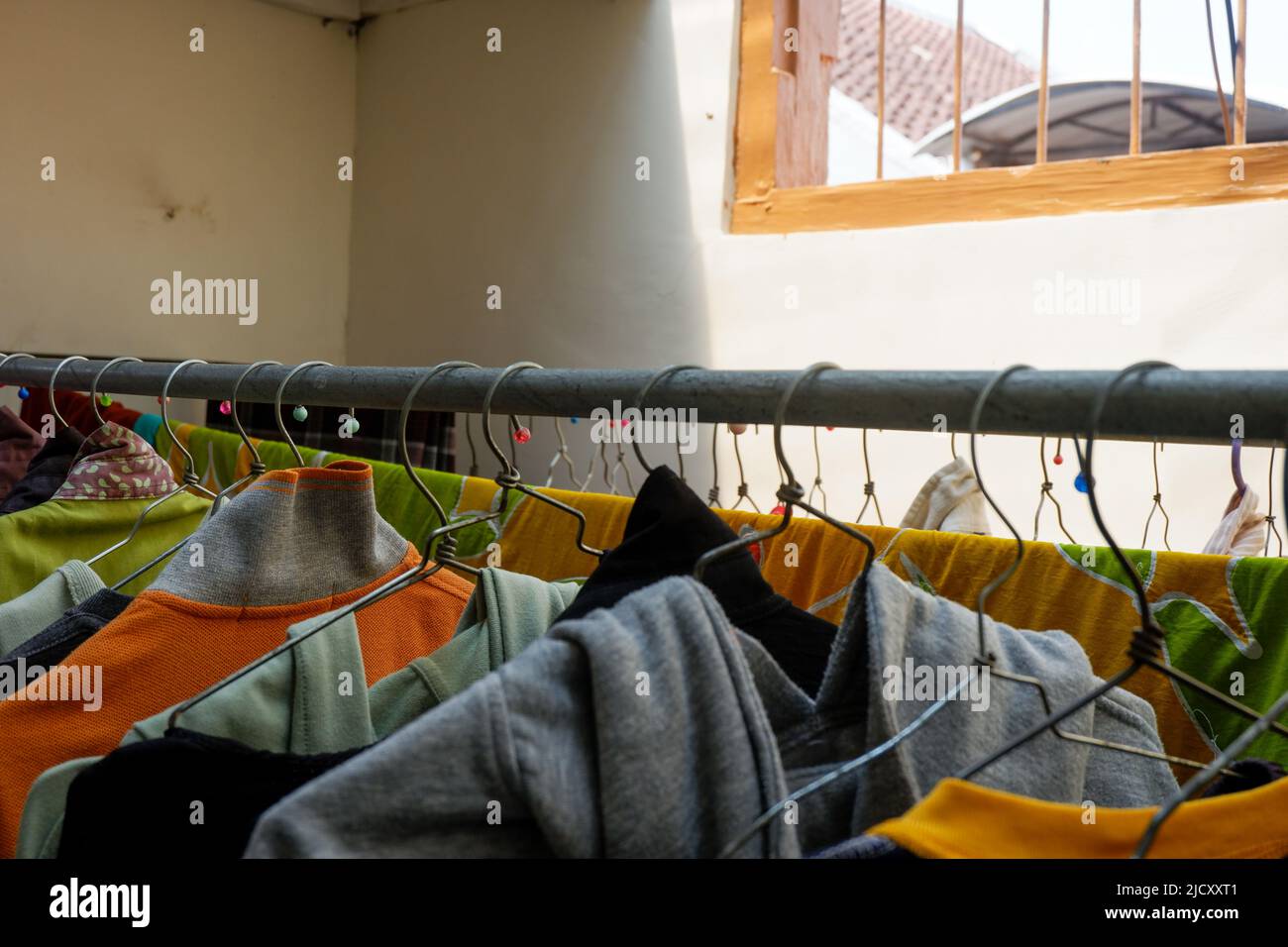 various colors of clothes that are dried Stock Photo - Alamy