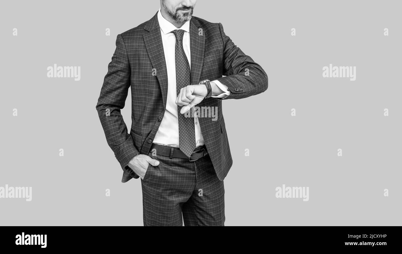 confident businessman man in businesslike suit checking time, time ...