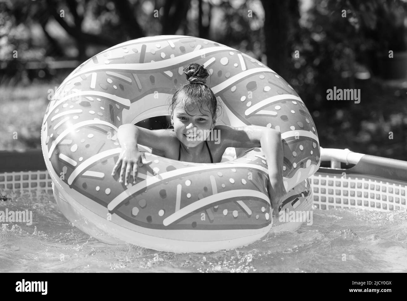 Float in pool hi-res stock photography and images - Alamy