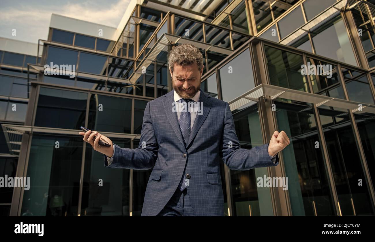 business negotiation. having problem. adult ceo with cellphone. phone ...