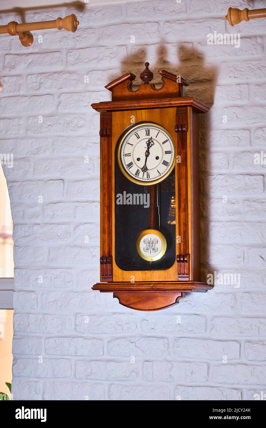 Photo of an old antique clock in a restaurant Stock Photo - Alamy