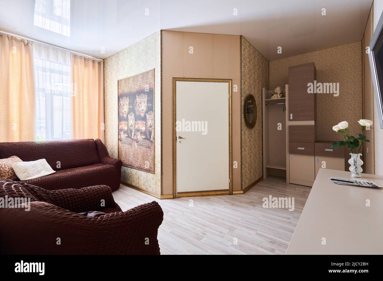 Cozy room with decor for daily rent Stock Photo - Alamy
