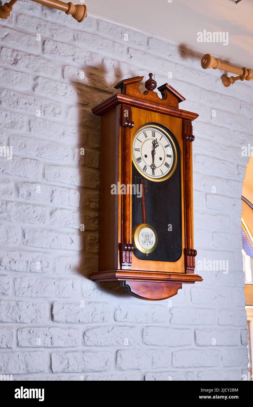 Photo of an old antique clock in a restaurant Stock Photo - Alamy