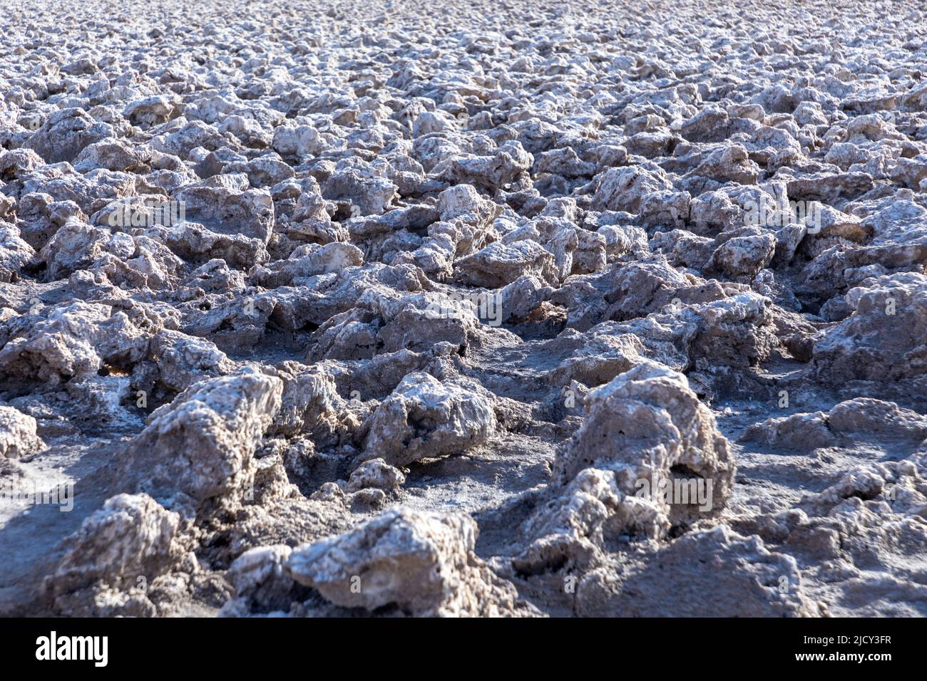 devils golf course, a dry salt lake with crusty saltern nformations in ...