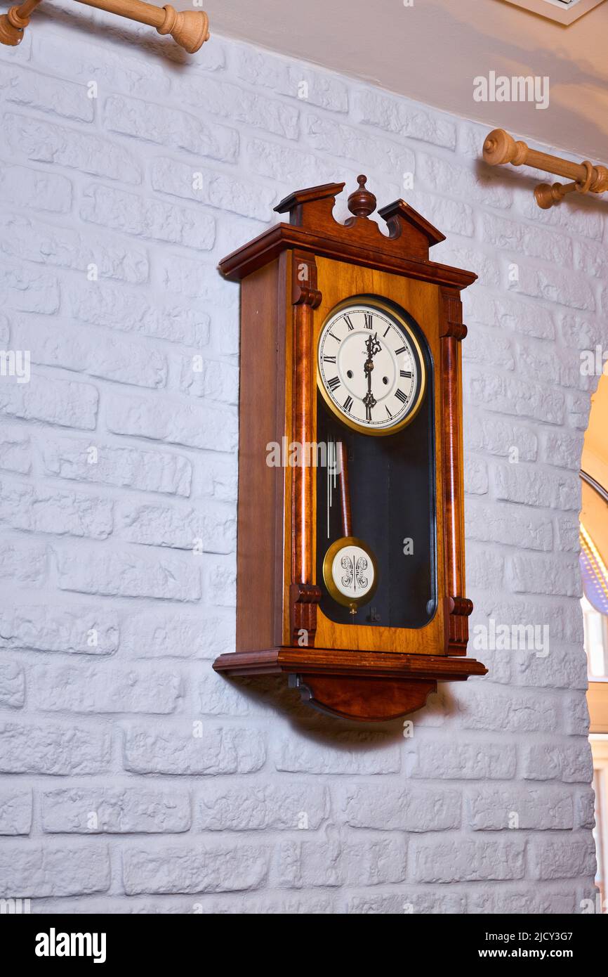 Photo of an old antique clock in a restaurant Stock Photo - Alamy