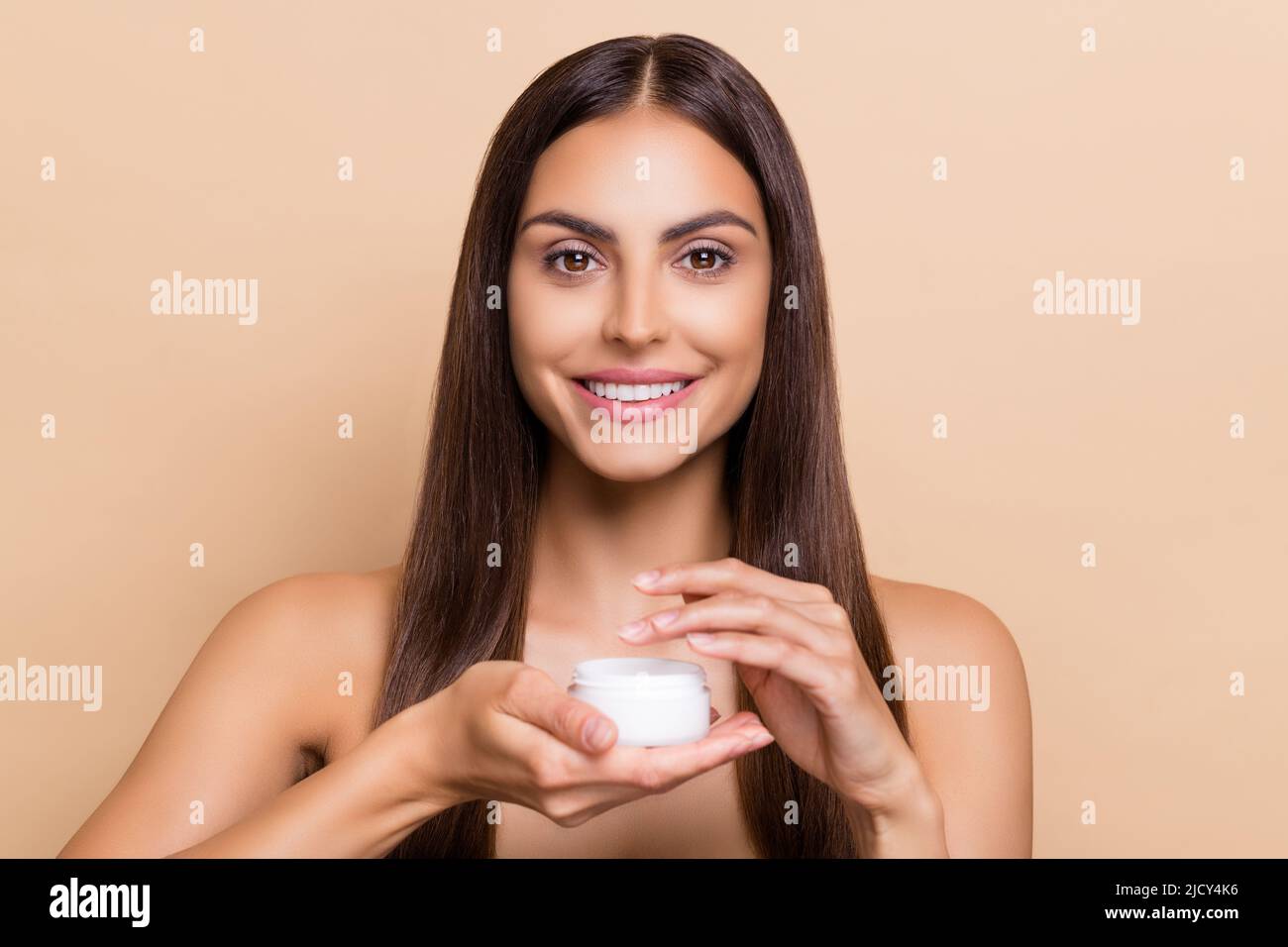 Portrait of attractive healthy girl using daily collagen cream flawless ...