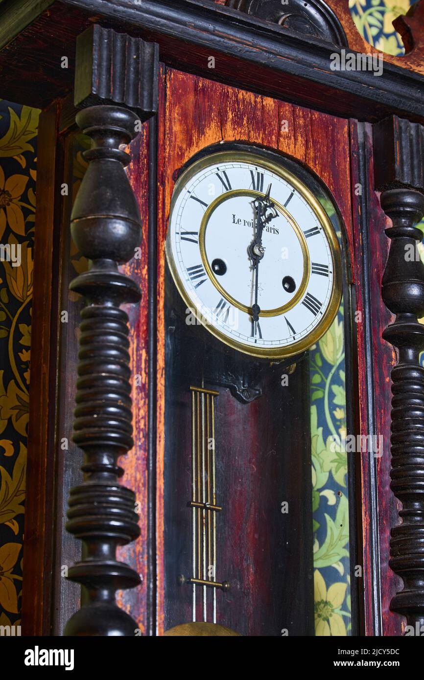 Photo of an old antique clock in a restaurant Stock Photo - Alamy