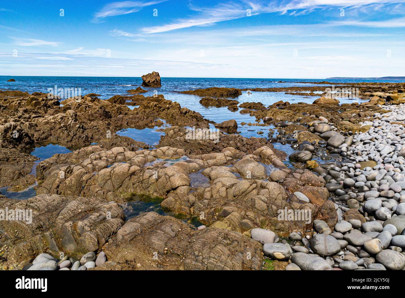 Colourful Sea View of Greencliff Beach, With Pebbles, Exposed Rocks and ...