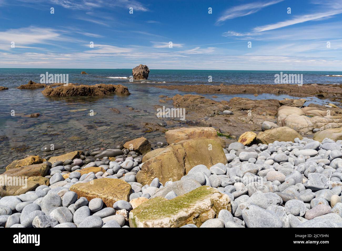 Scenic Sea View of Greencliff Beach, With, Pebbles, Exposed Rocks, Rock ...