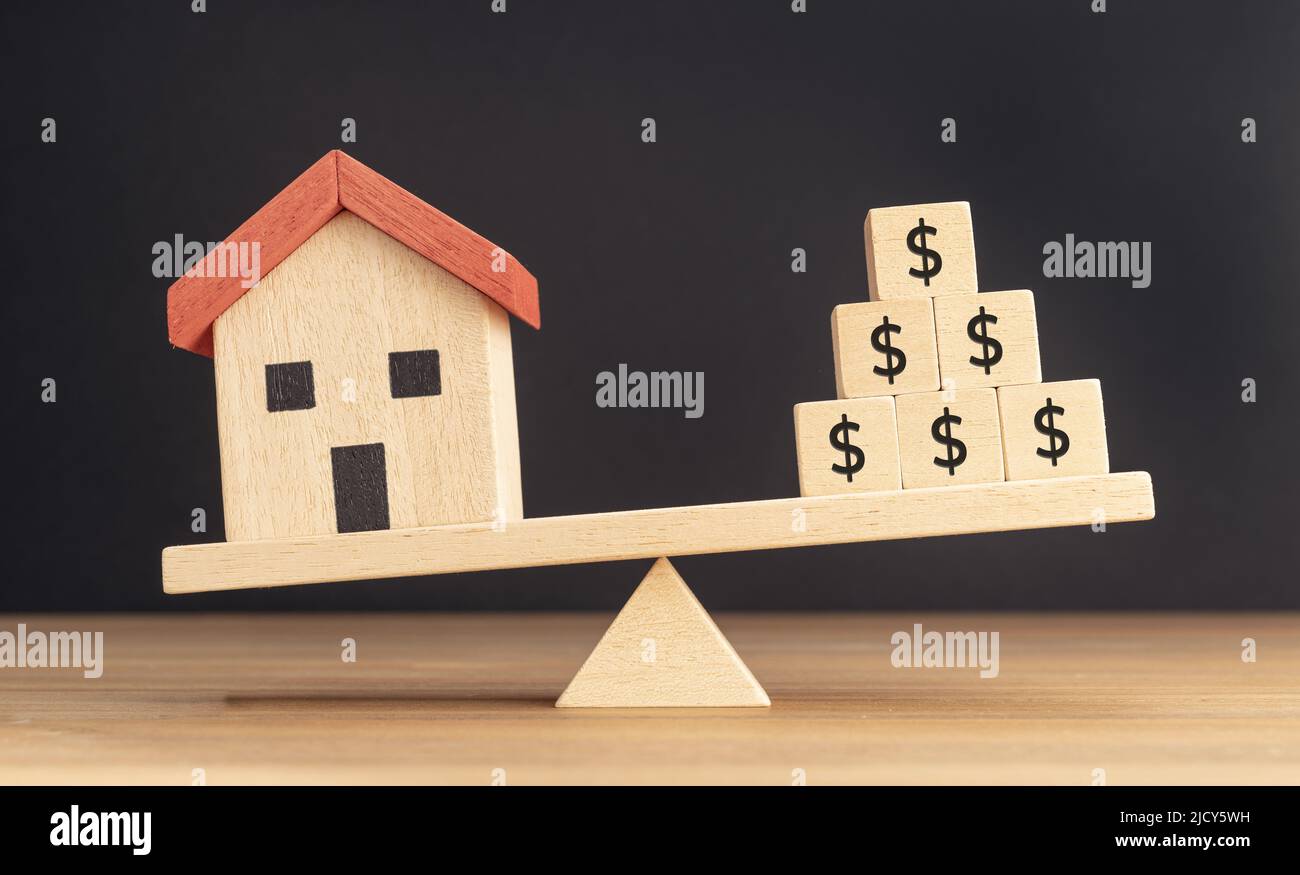 House or Property investment concept. House model and wooden blocks ...