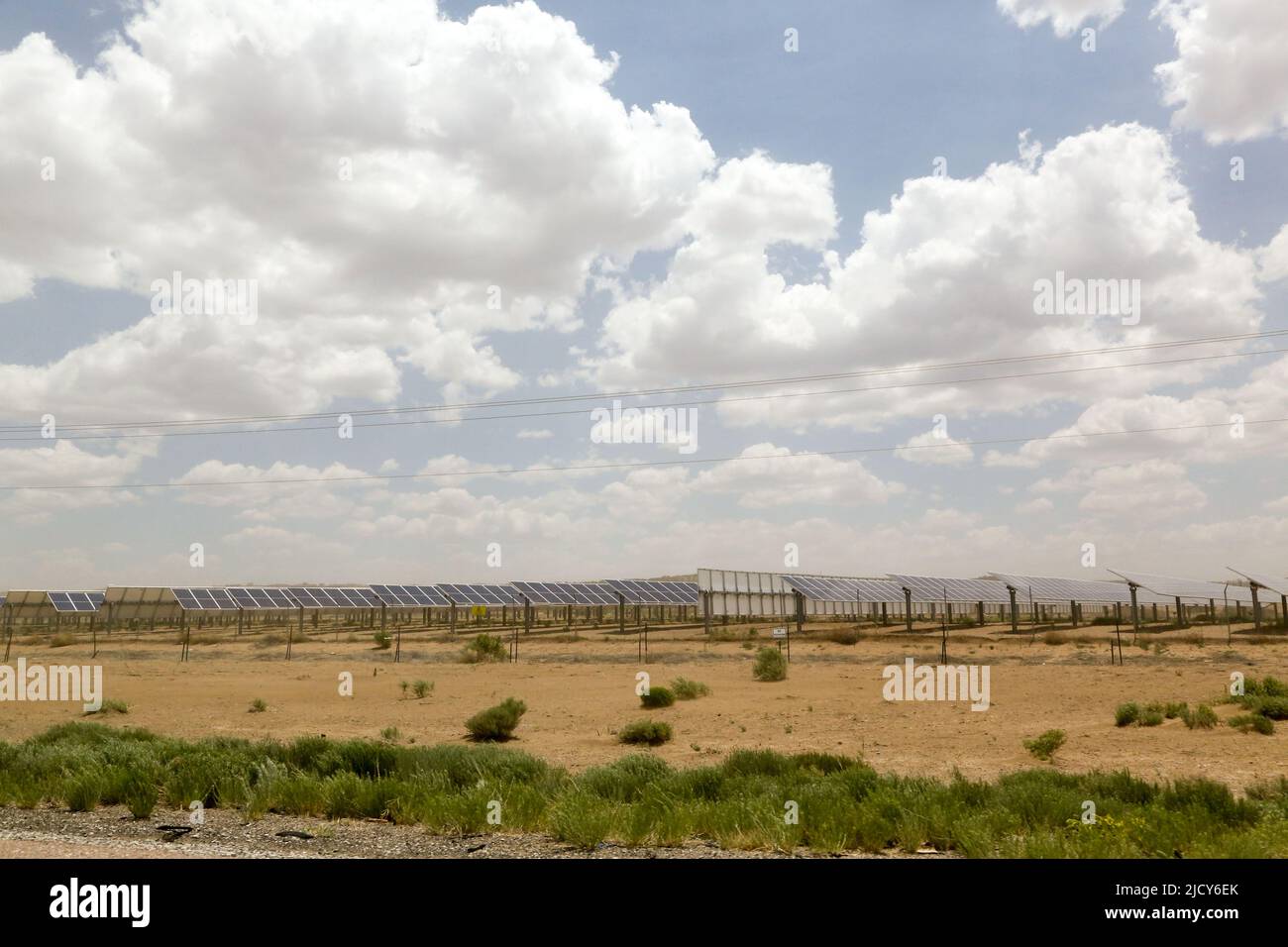 A large field of Solar panels sit outside of Gallup, New Mexico USA on ...