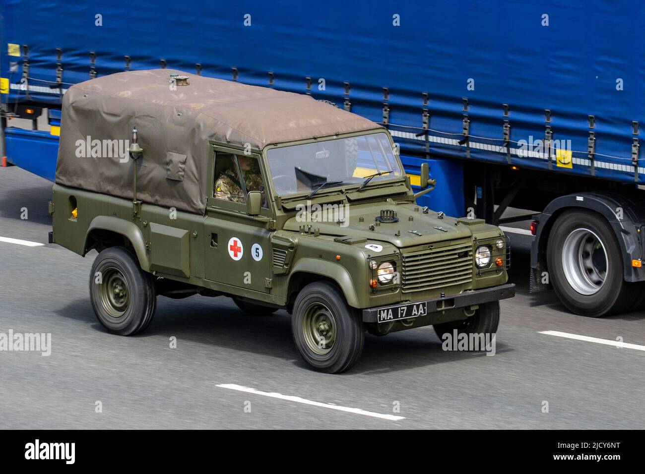 British Army Land Rover driving on the M6 motorway UK Stock Photo - Alamy