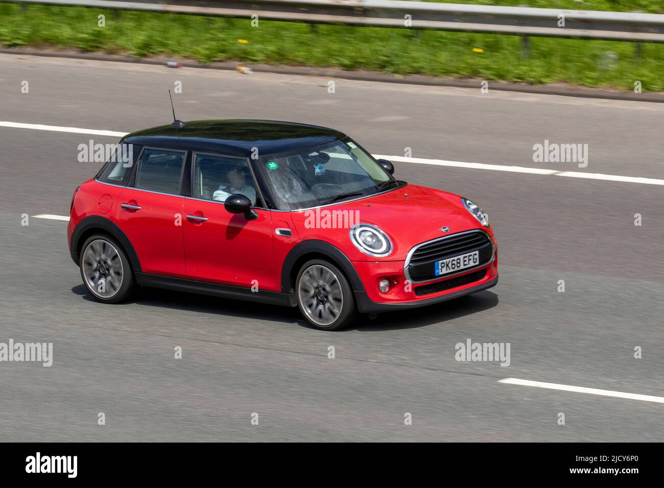 2018 red Mini Cooper; driving on the M6 Motorway, Manchester, UK Stock ...