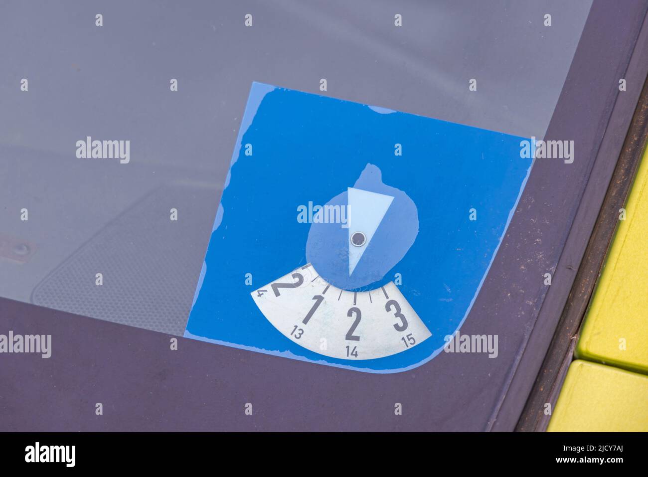 Arrival Time Parking Disc Cover in Vehicle Windscreen Stock Photo - Alamy