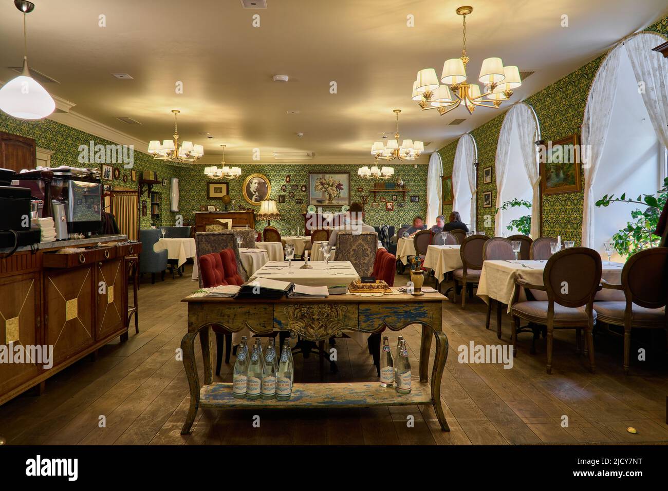 Interior of an old restaurant with warm light Stock Photo - Alamy
