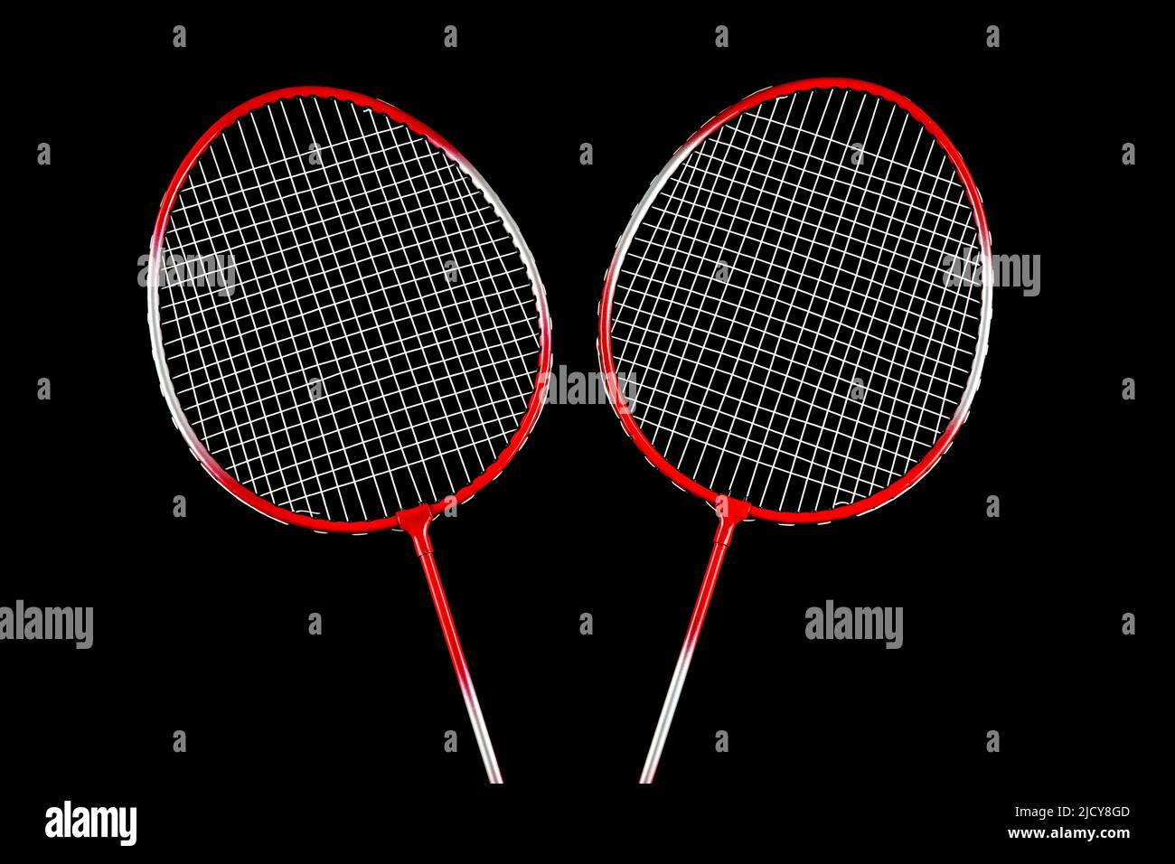 Two badminton rackets isolated against a black background Stock Photo ...