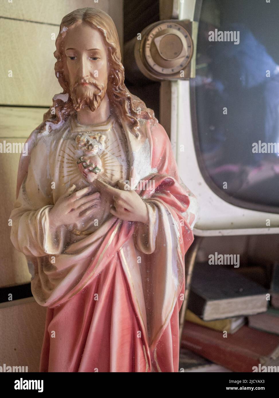 religious statues in an abandoned house Stock Photo - Alamy