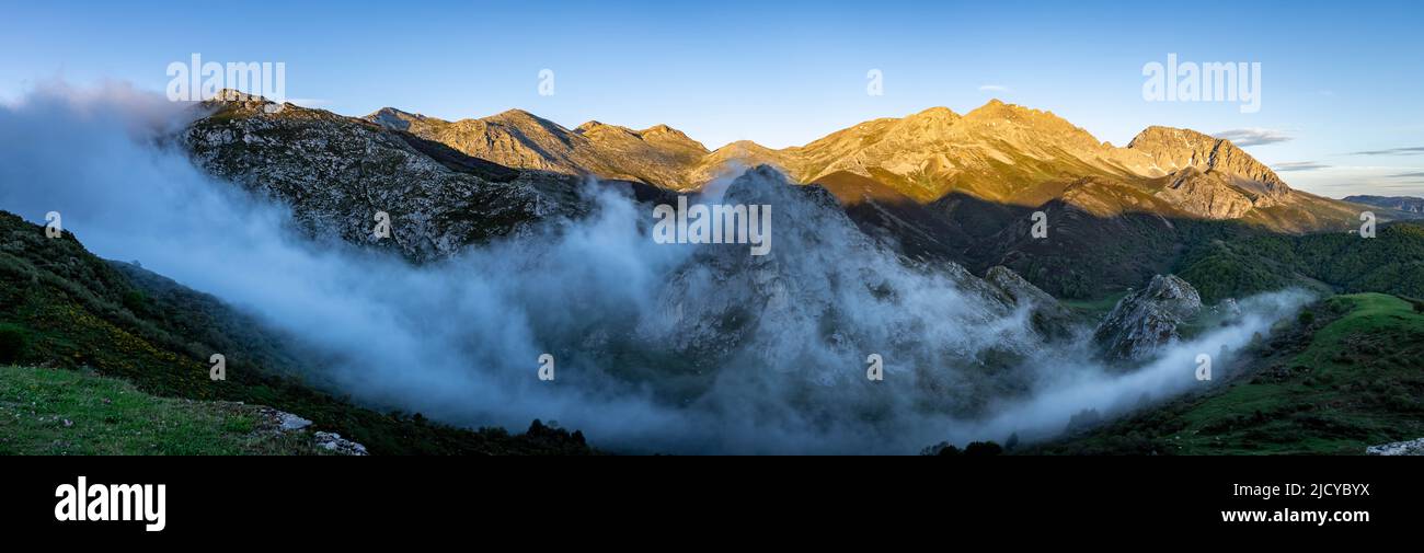 Beautiful mountains of Asturias Spain with the arrival of a dense cloud ...