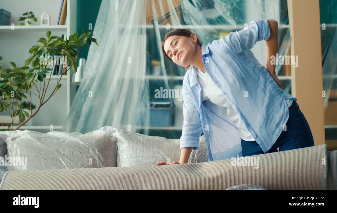 Pretty Woman Feels Sudden Back Pain When Carry and Dropping on the ...