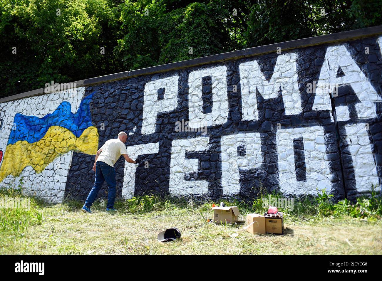 KYIV, UKRAINE - JUNE 16, 2022 - The graffiti 'Roman Ratushnyi. Heroes ...