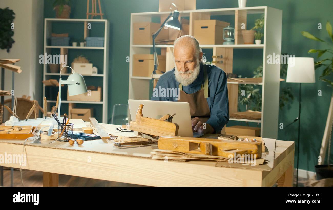 A Focused Carpenter Develops Layouts from Wood Models 3D Sketches Using ...