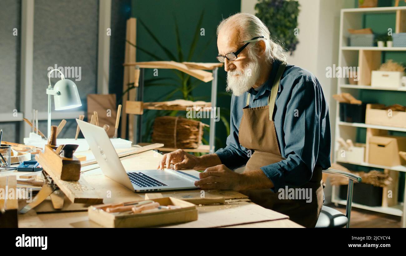 A Focused Carpenter Develops Layouts from Wood Models 3D Sketches Using ...