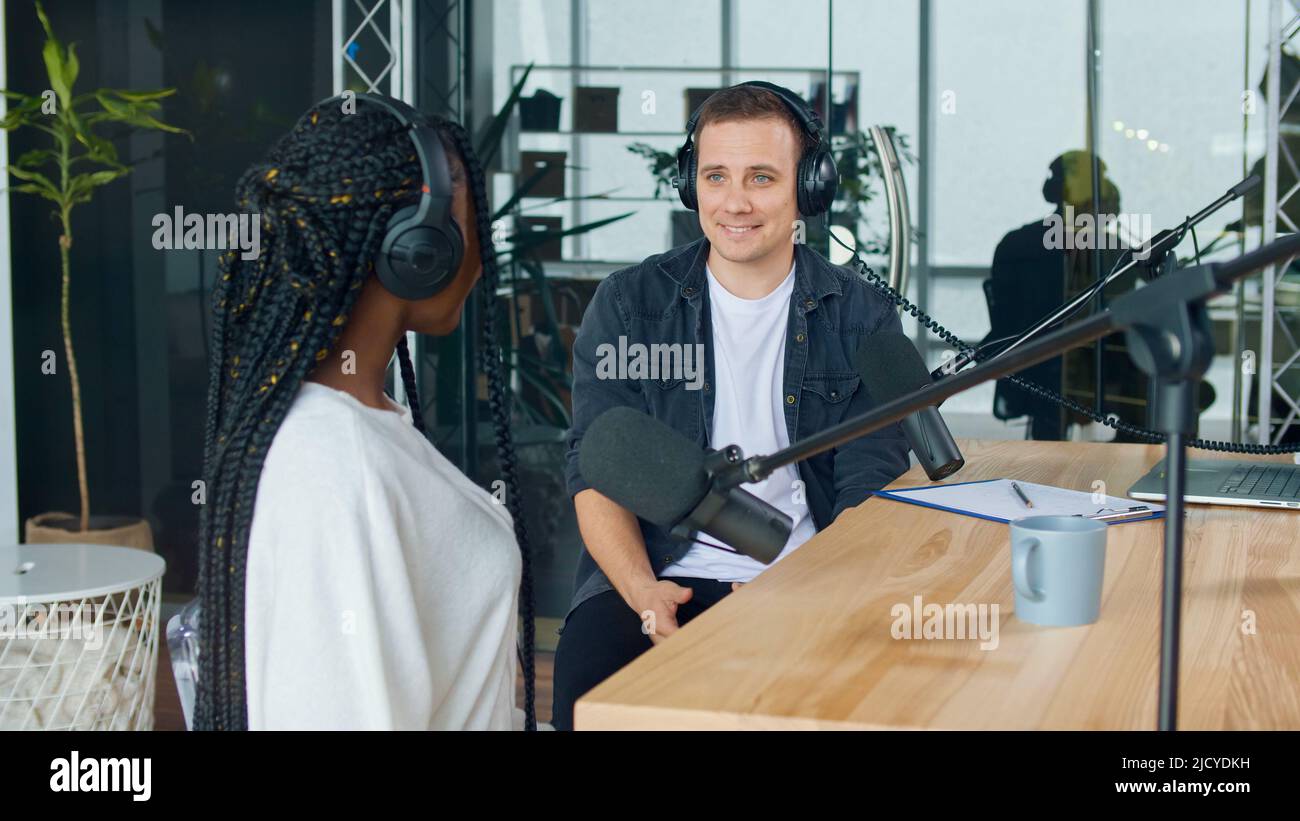 Broadcasts a Live Radio Interview With Spbd. Male Host Sharing Content ...