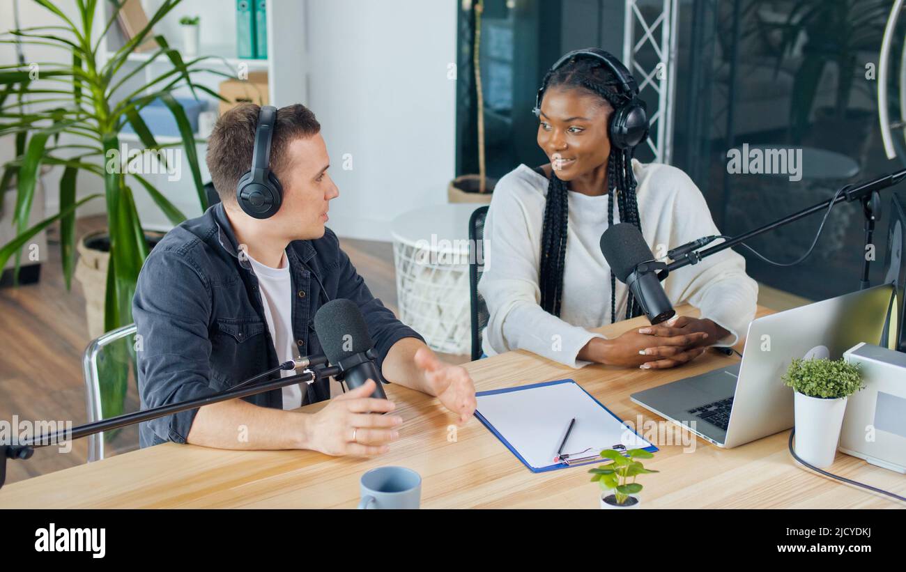 Broadcasts a Live Radio Interview With Spbd. Male Host Sharing Content ...