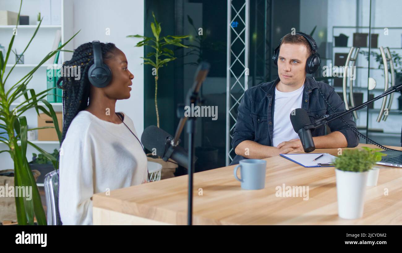 Broadcasts a Live Radio Interview With Spbd. Male Host Sharing Content ...
