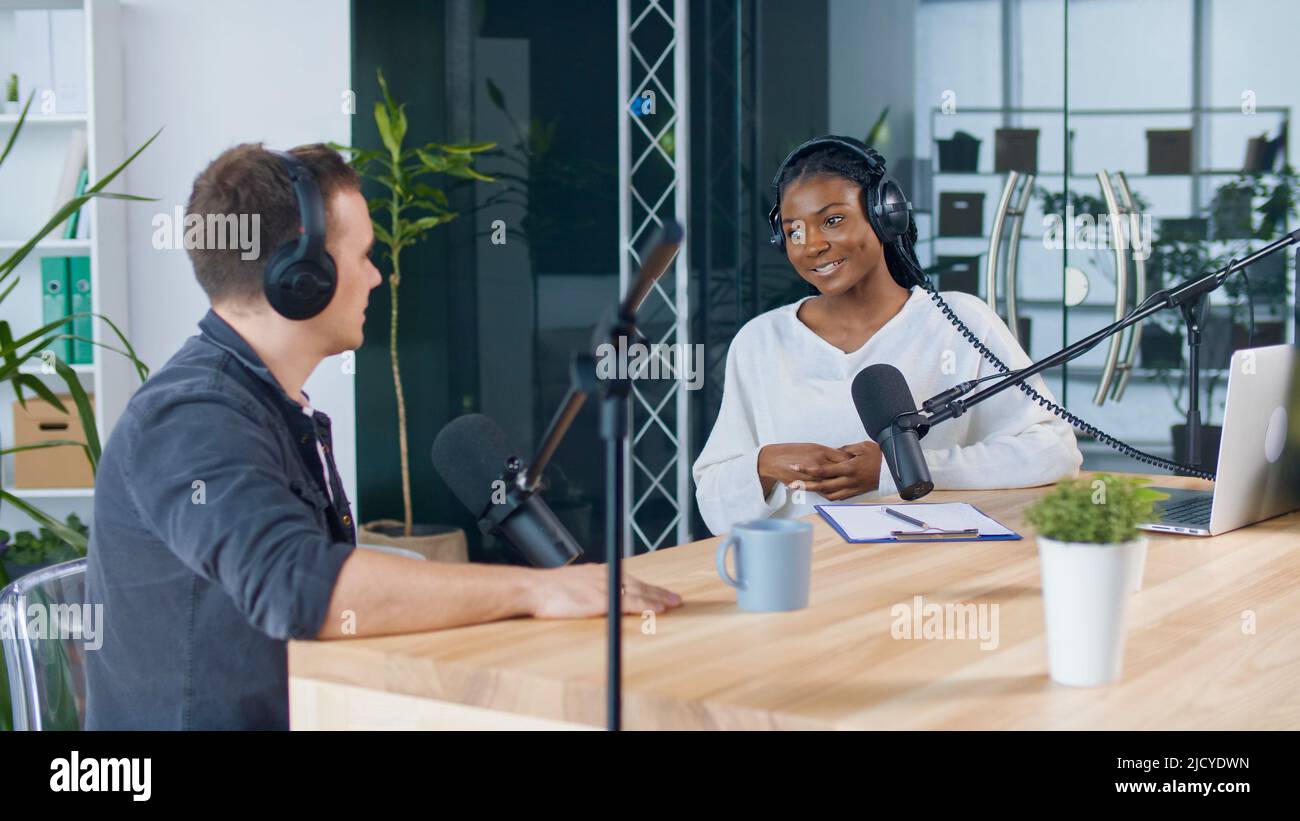 Commentator talking speaking into microphone hi-res stock photography ...