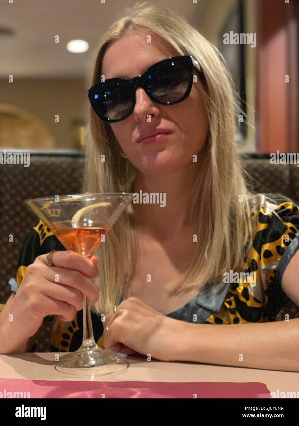 Lady drinking a cocktail hi-res stock photography and images - Alamy