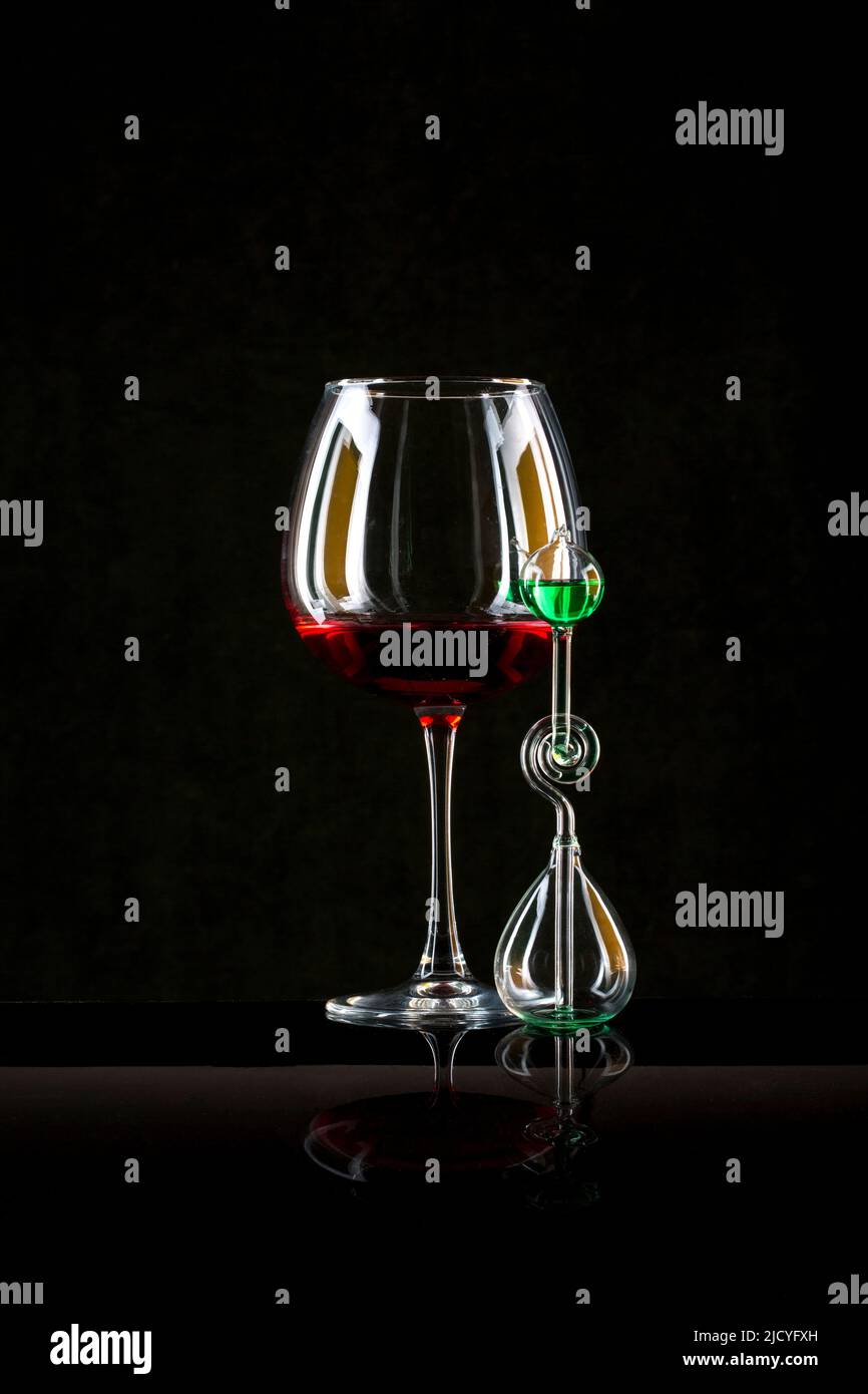 Still life with glass objects on a black background Stock Photo - Alamy
