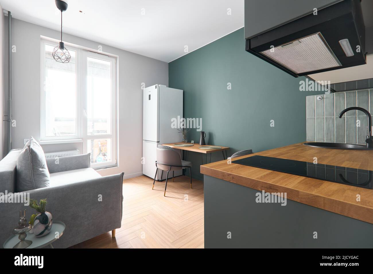 Photo of the kitchen in green colors Stock Photo - Alamy