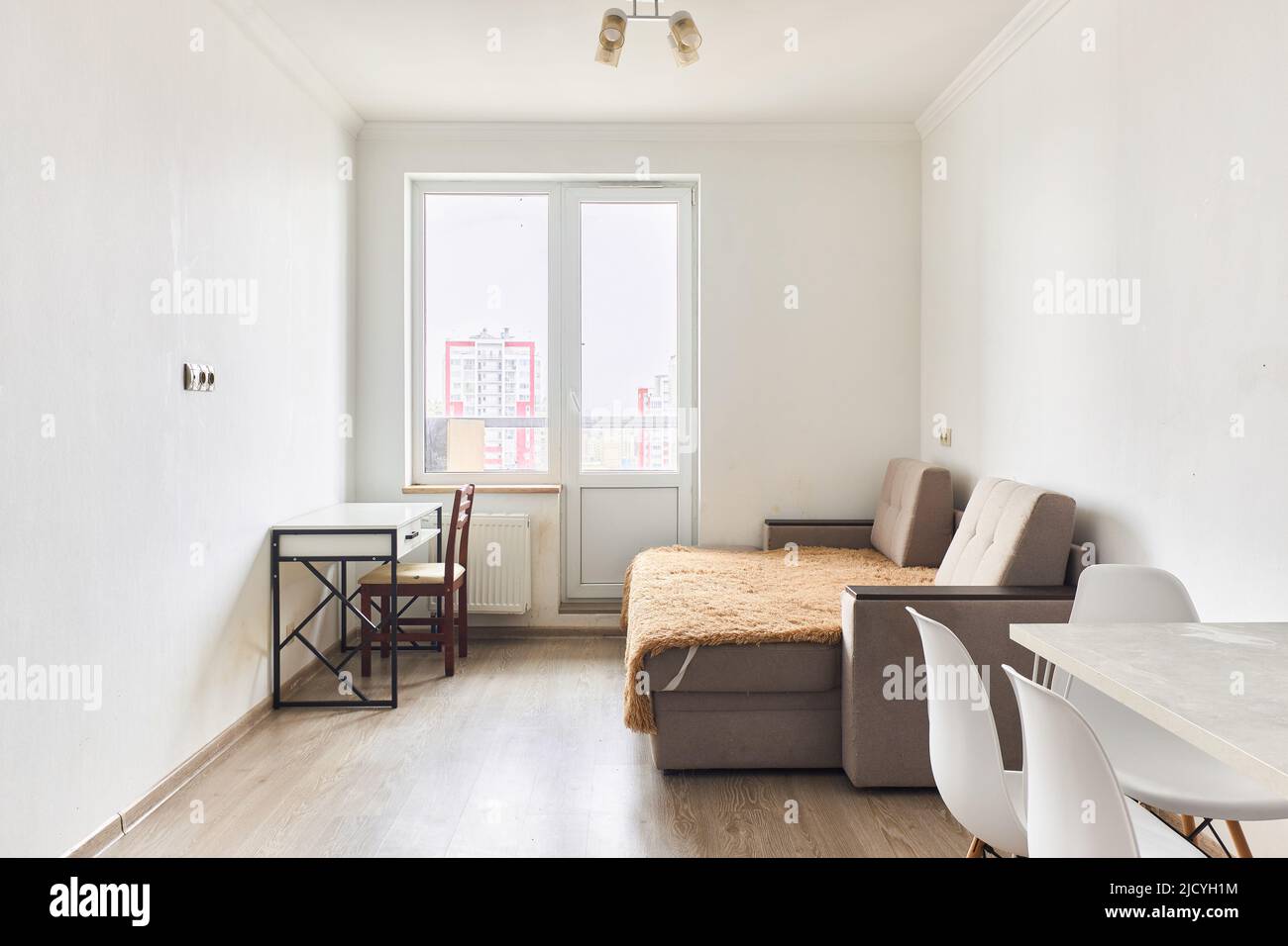 A cozy studio apartment with different decor Stock Photo - Alamy